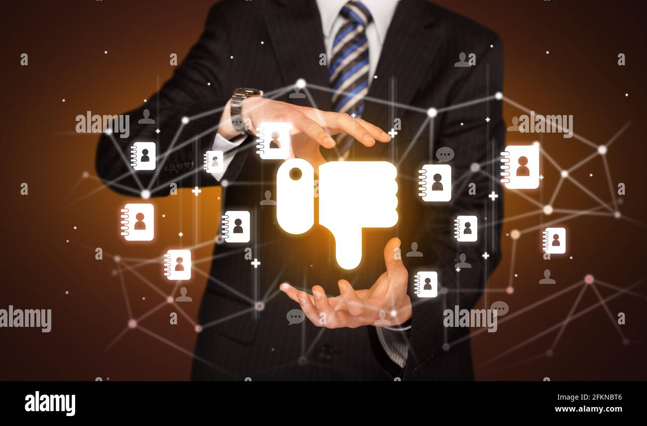 Hand holding social media icons Stock Photo - Alamy