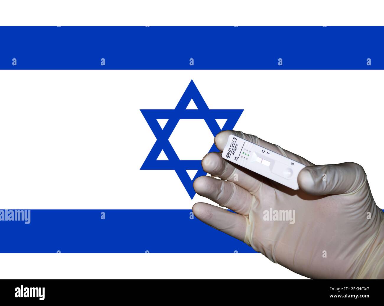 a hand showing a corona quick test in front of an israeli flag Stock ...