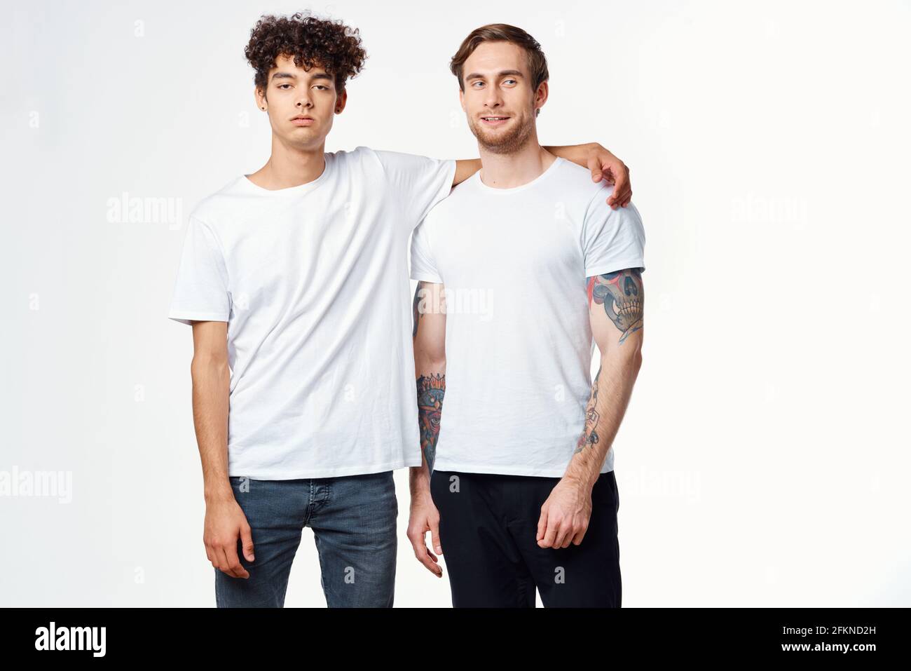 two men friendship hug emotions communication studio Stock Photo - Alamy