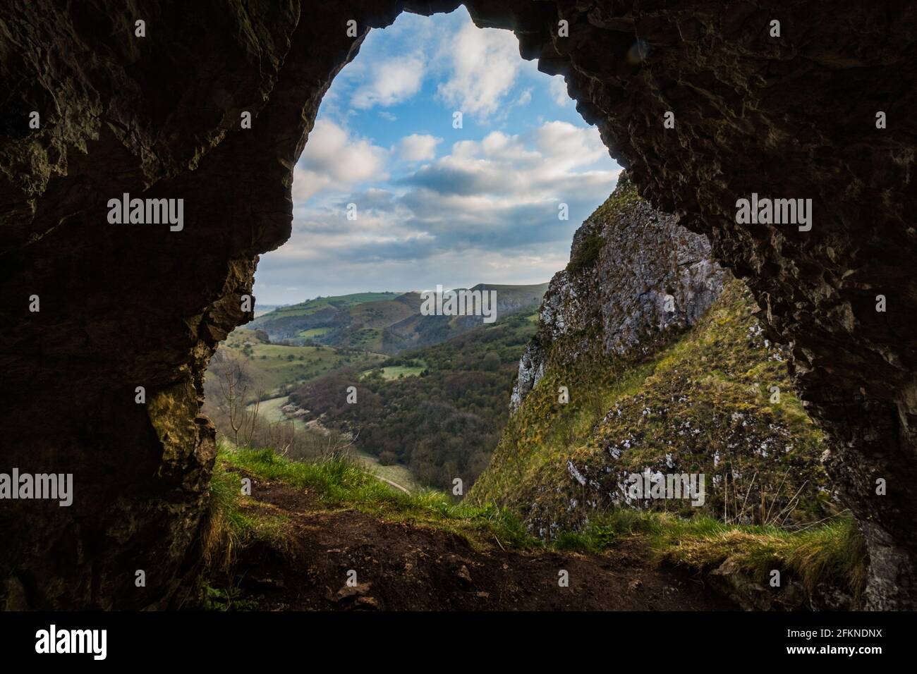 Climbing up in the mount on the morning in the Peak District, Thor Cave ...