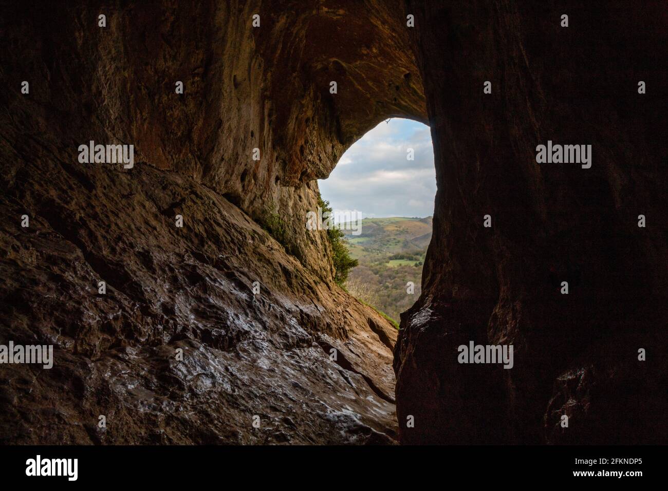 Climbing up in the mount on the morning in the Peak District, Thor Cave ...