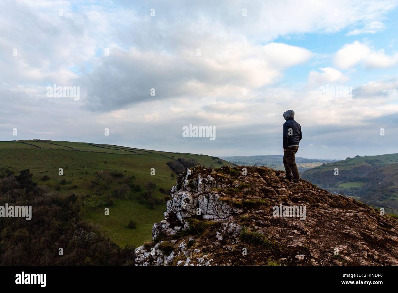 Climbing up in the mount on the morning in the Peak District, Thor Cave ...
