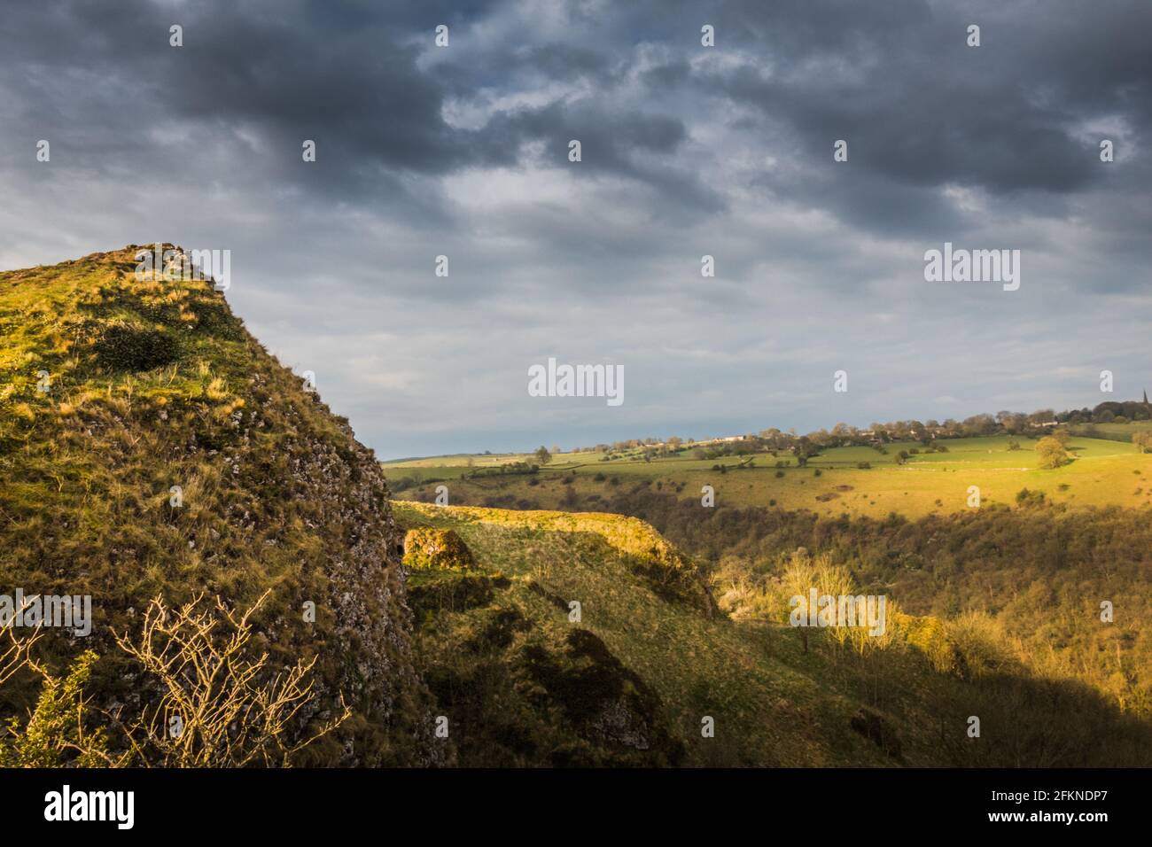 Climbing up in the mount on the morning in the Peak District, Thor Cave ...