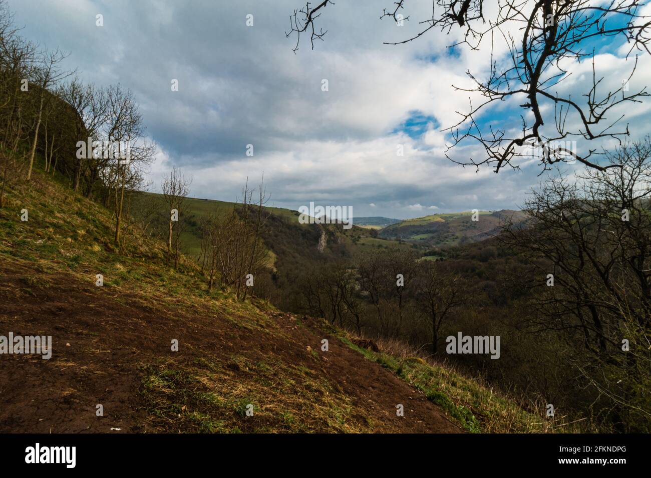Climbing up in the mount on the morning in the Peak District, Thor Cave ...