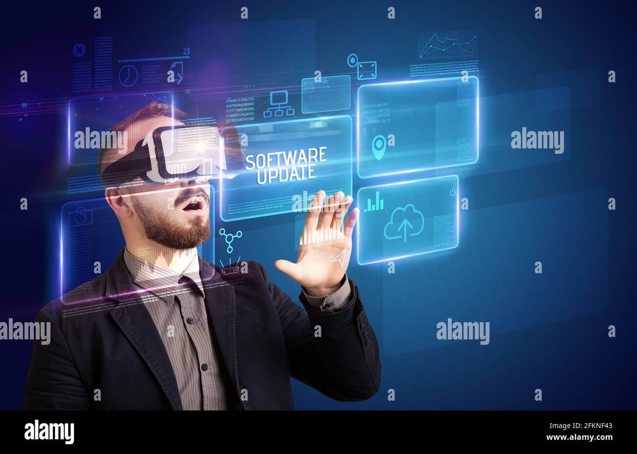Businessman looking through Virtual Reality glasses, tech concept Stock ...