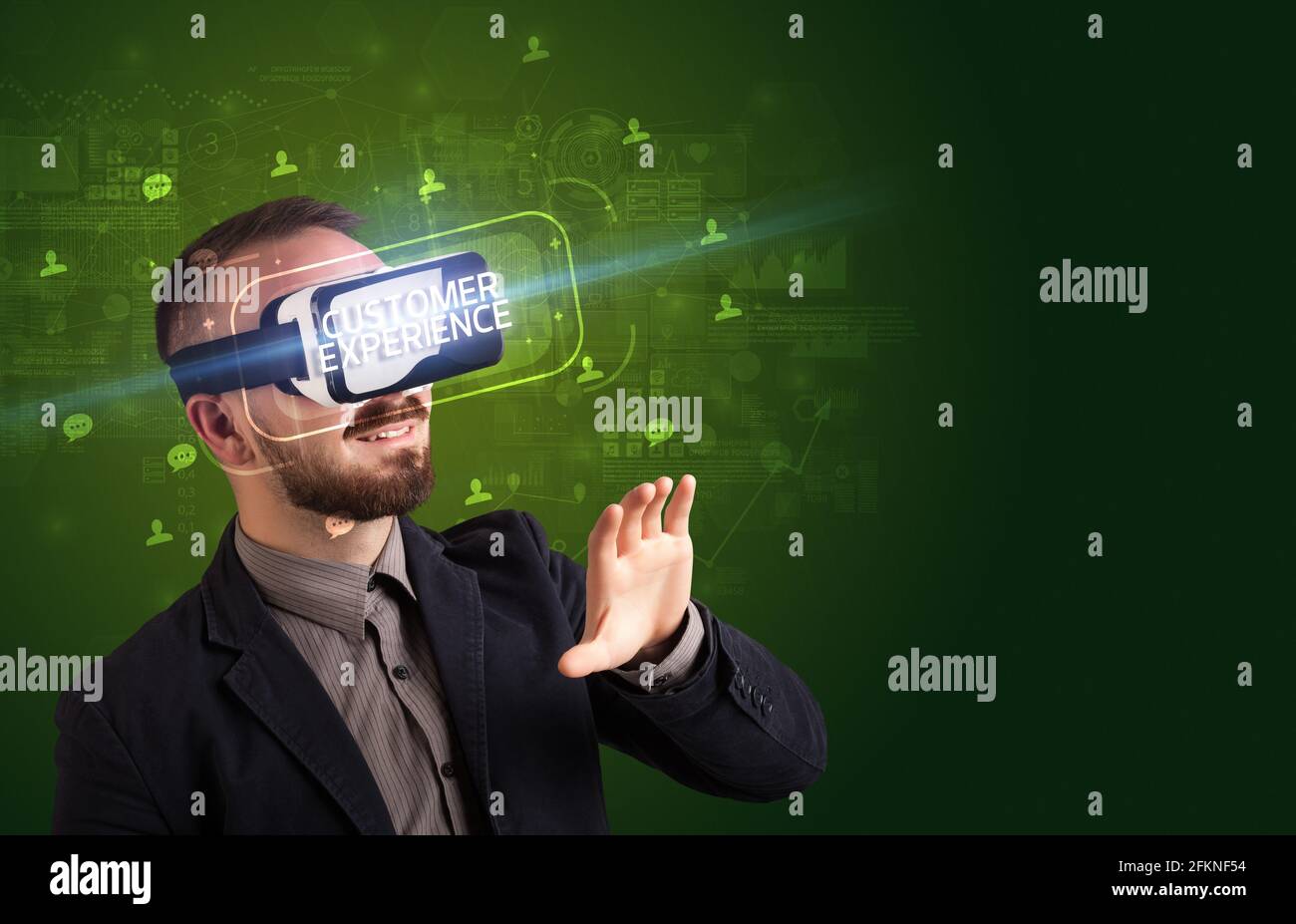 Businessman looking through Virtual Reality glasses, social media ...