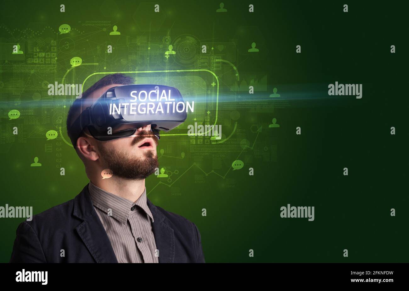 Businessman looking through Virtual Reality glasses, social media ...