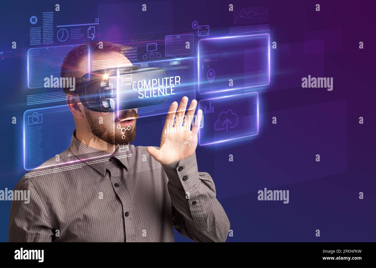 Businessman looking through Virtual Reality glasses, tech concept Stock ...