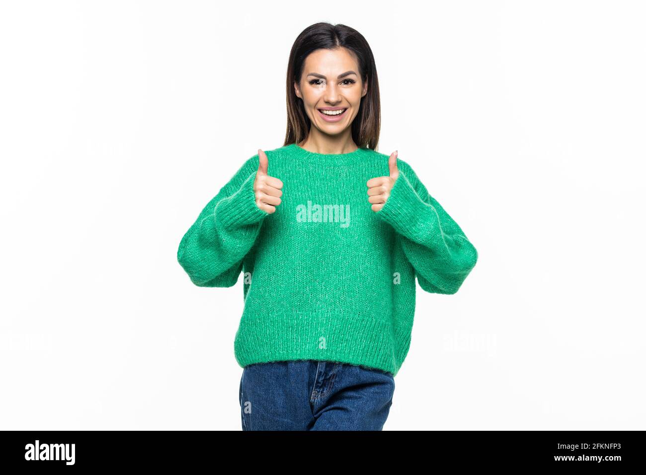 Portrait of beautiful woman with thumbs up sign isolated on white ...
