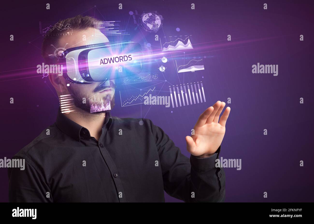 Businessman looking through Virtual Reality glasses Stock Photo - Alamy