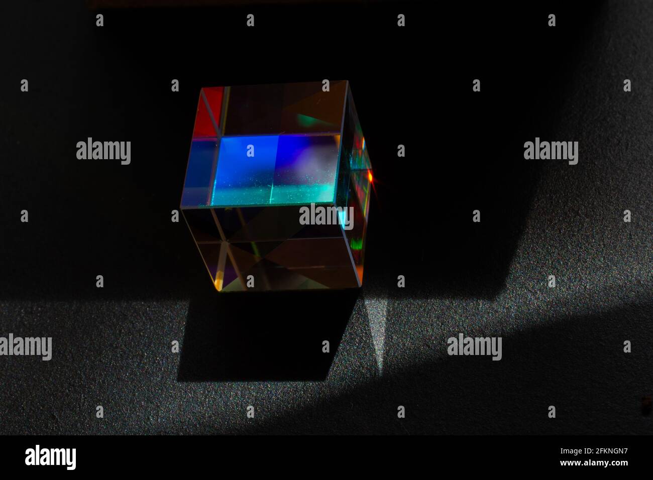 Optical glass cube Light dispersion,spectrum. Physics optics ray refractions Stock Photo - Alamy