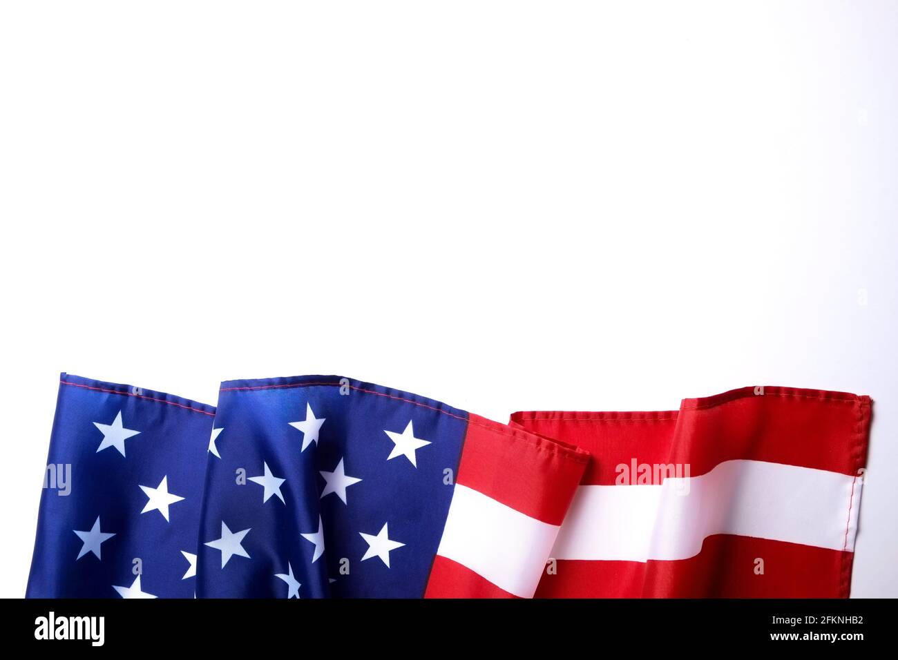 Patriotic composition w/ ruffled American flag on black background ...