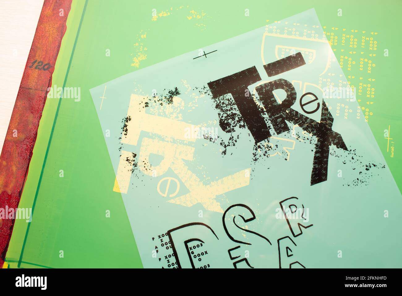 Serigraphy silk screen print process at clothes factory. Frame and ...