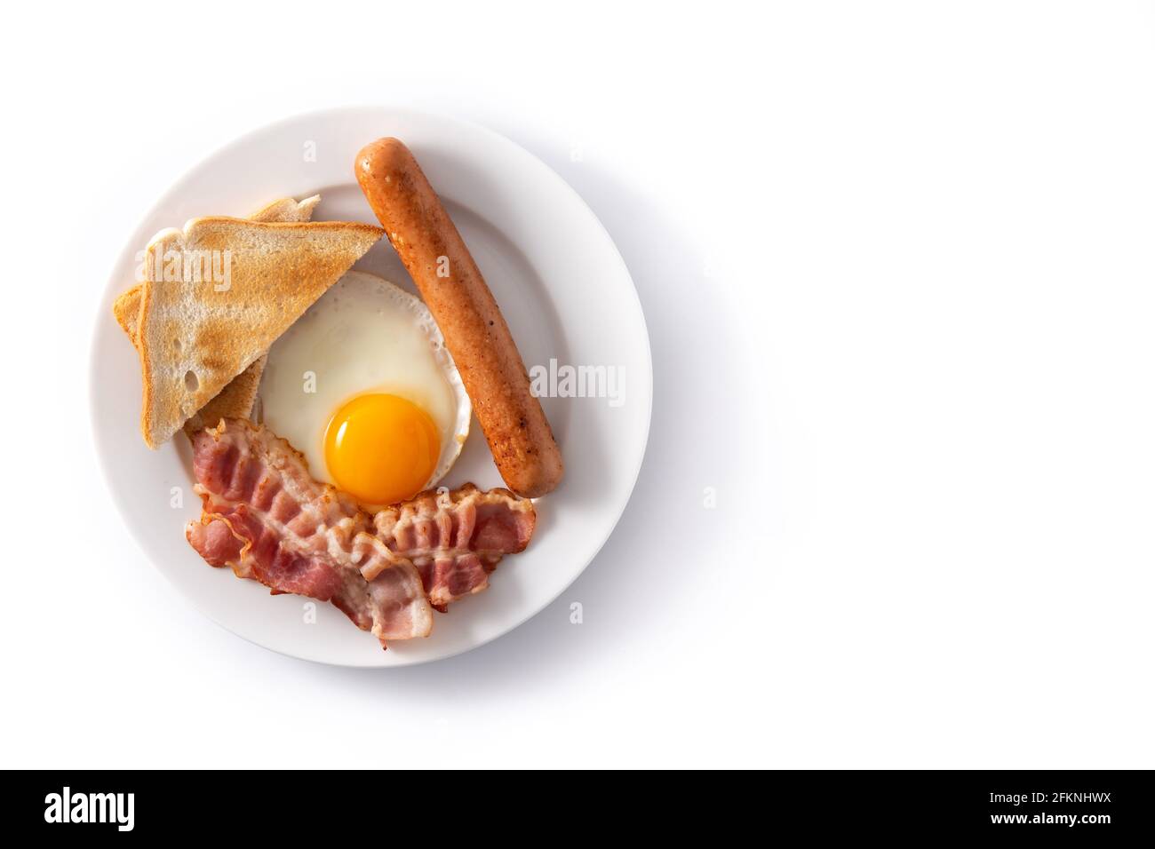 Traditional American breakfast with fried egg,toast,bacon and sausage ...