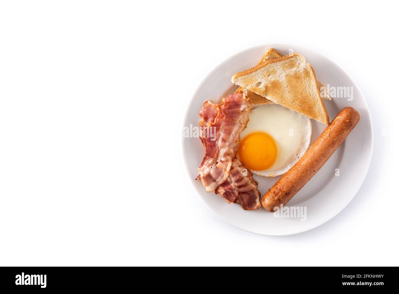 Traditional American breakfast with fried egg,toast,bacon and sausage ...