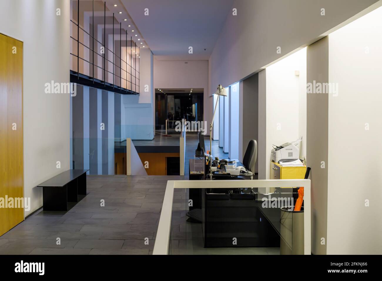 Generic empty office lobby entrance with receptionist secretary desk ...