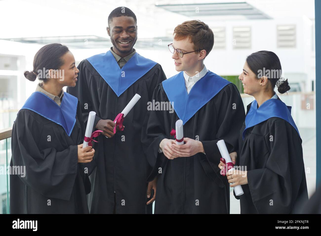 Uniform graduate graduation group hi-res stock photography and images ...