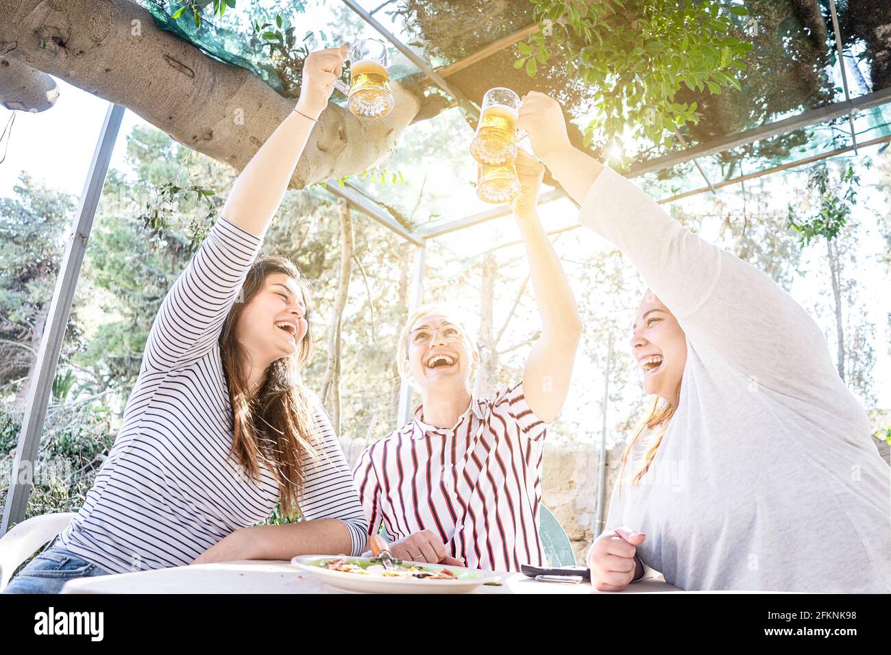 group of young friends free celebrate happy freedom toast with beer ...