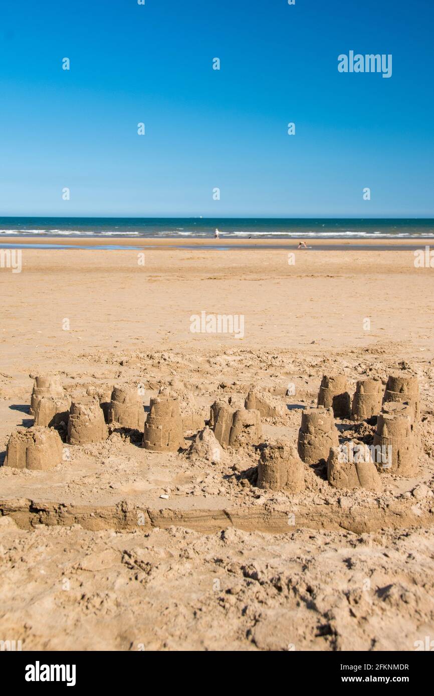 Yorkshire, UK – 10 Aug 2017 : sandcastle left to crumble alone on ...