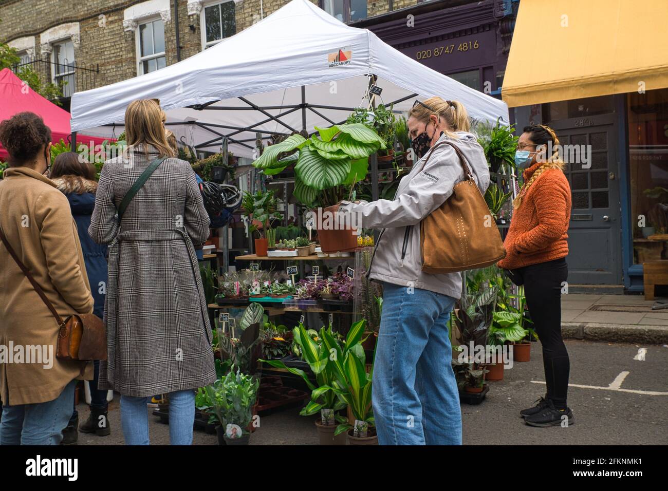 London, UK. 2nd May, 2021. Chiswick's monthly Sunday flower market ...