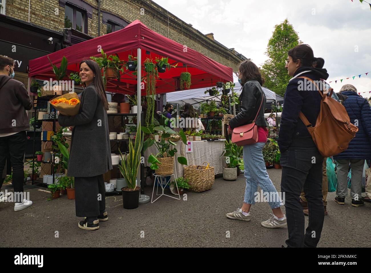 London, UK. 2nd May, 2021. Chiswick's monthly Sunday flower market ...