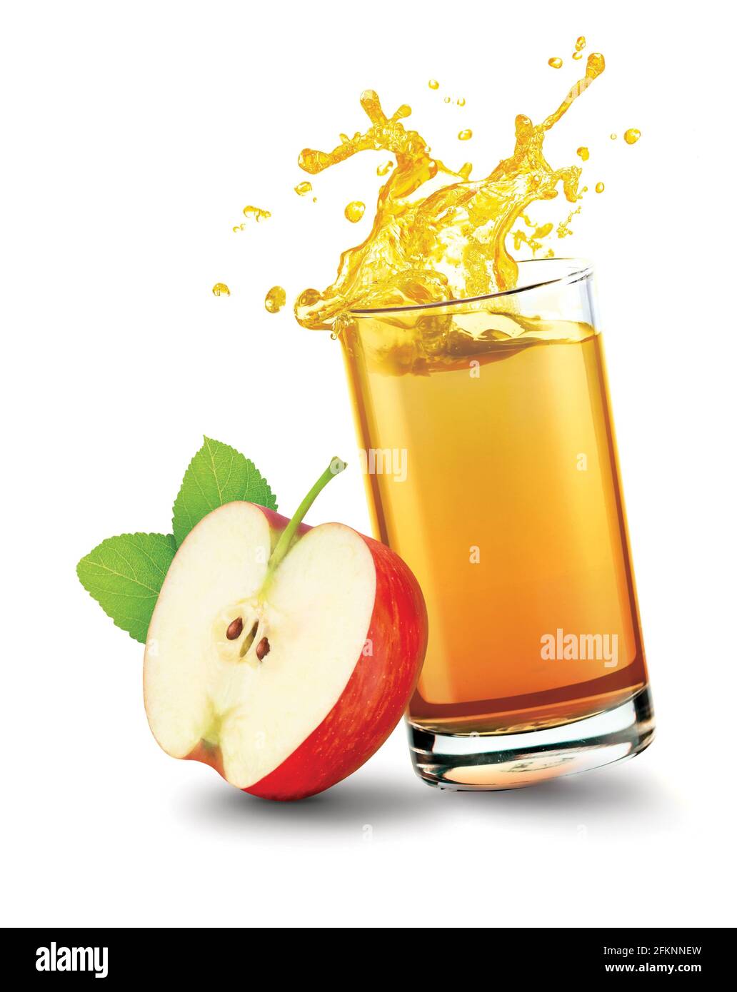 Apple juice splash out of glass with apple fruit on white background ...