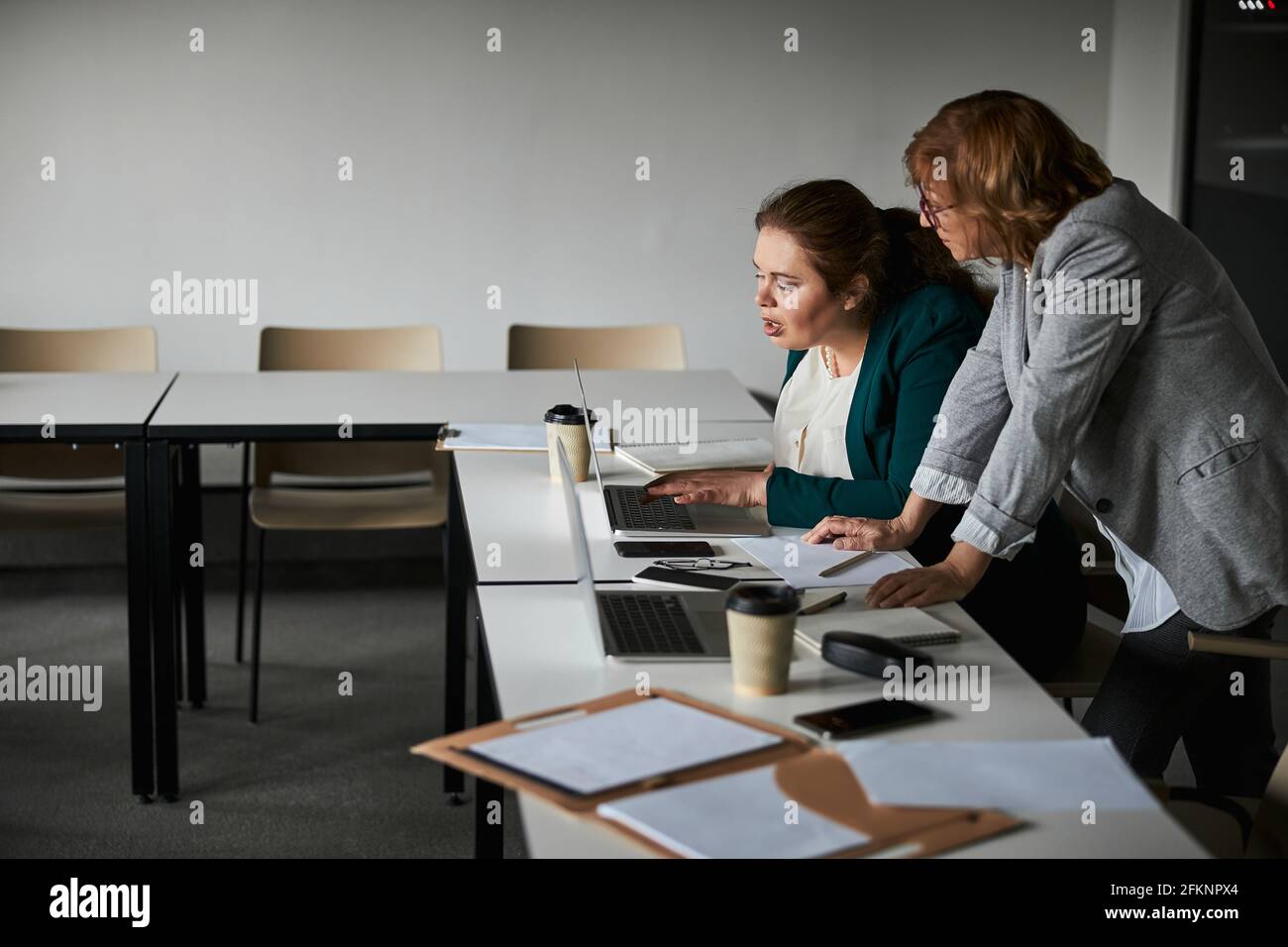 Female secretary under table hi-res stock photography and images - Alamy