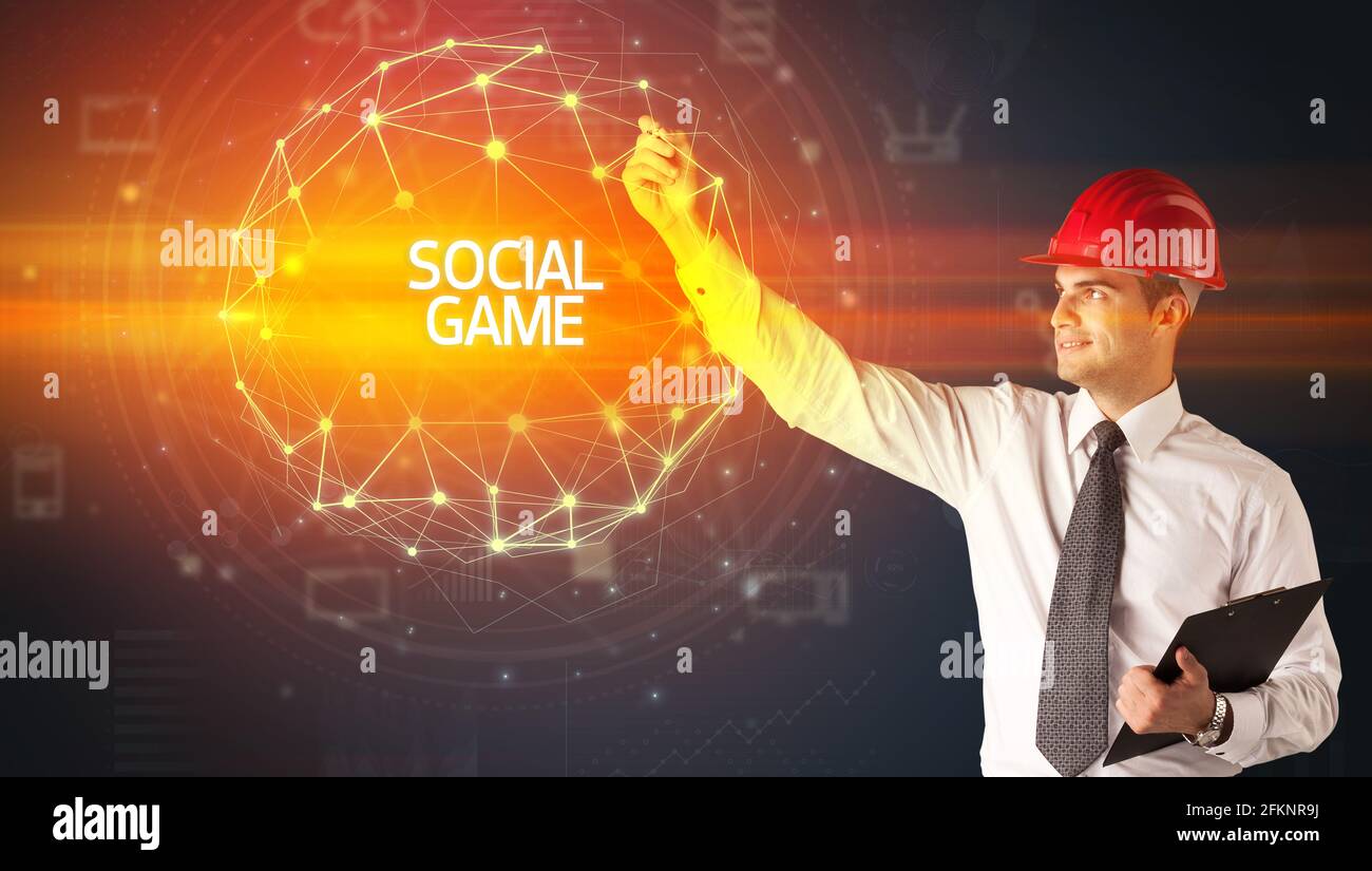 Handsome businessman with helmet drawing Stock Photo - Alamy