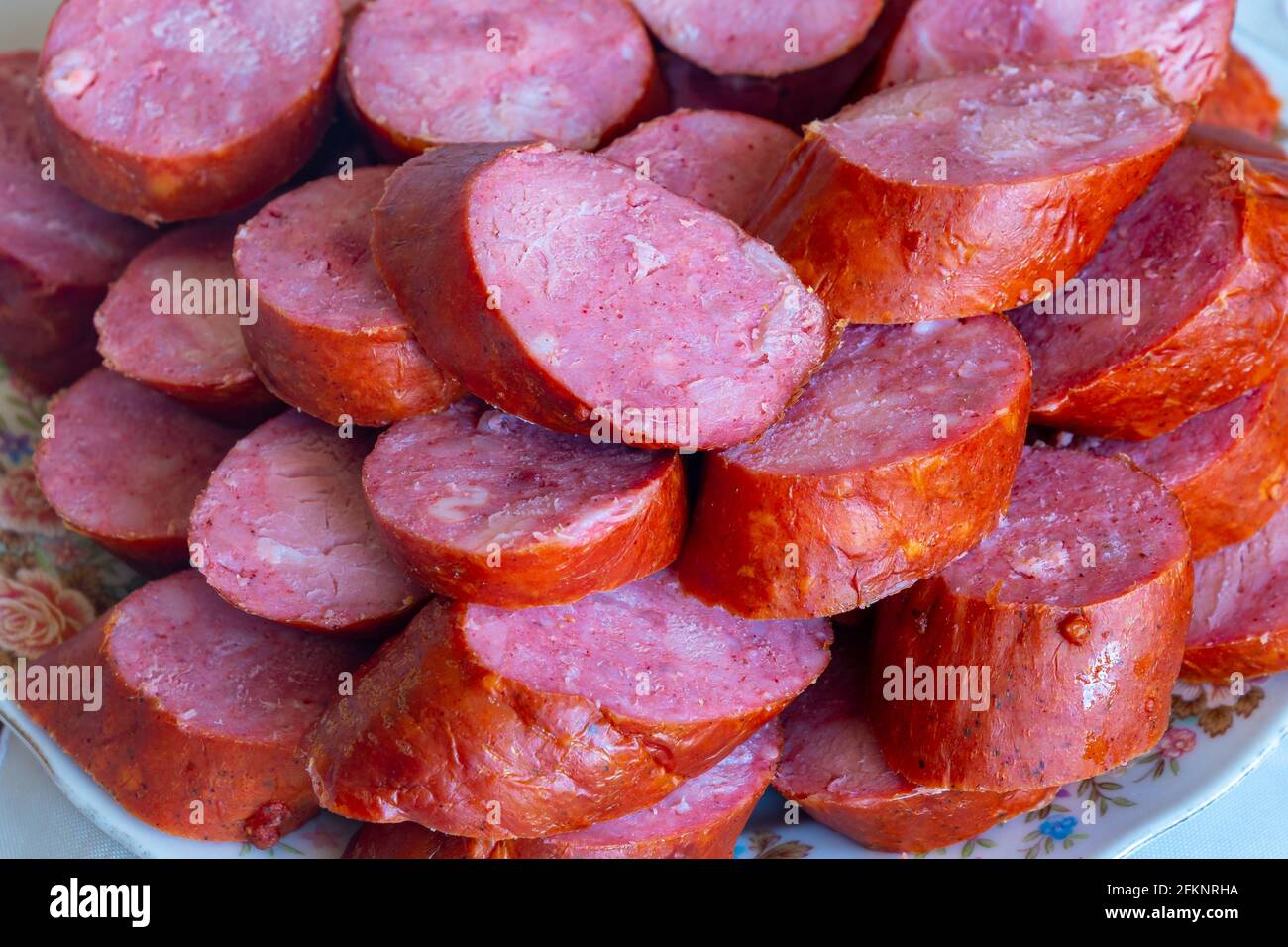 Sausage cut into slices, typical delicatessen product from Eastern ...