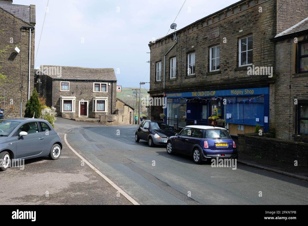 The village main street, Midgley, Calderdale, UK. A former Co-Op shop ...