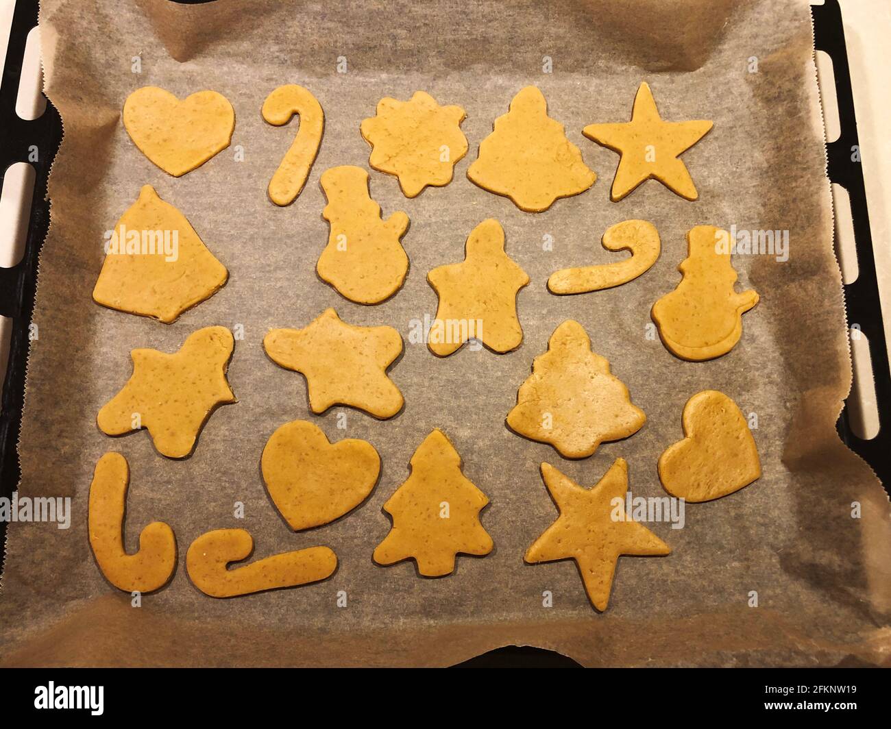 Family preparing christmas cookies hi-res stock photography and images ...