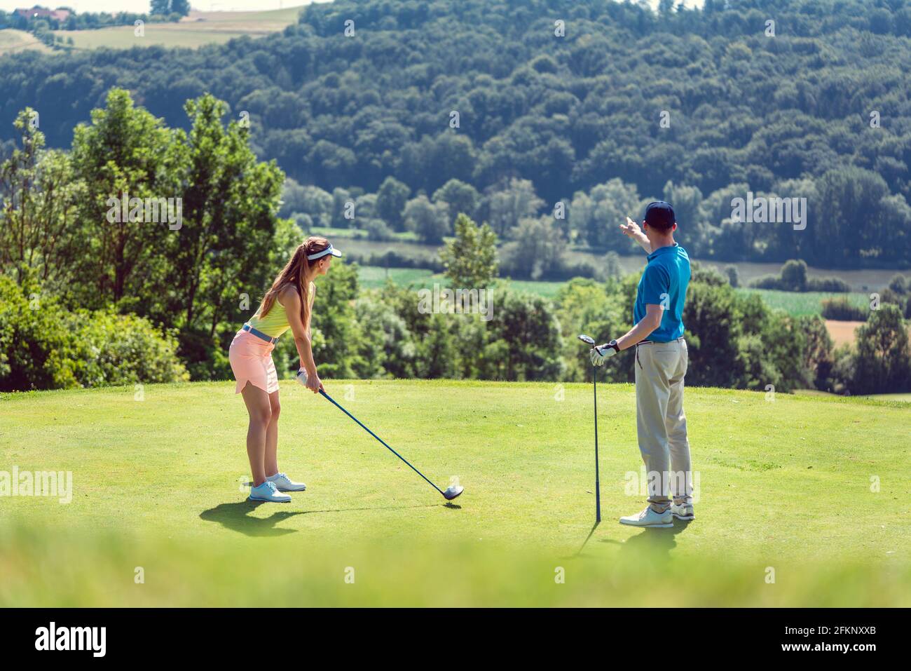 Couple on golf course hi-res stock photography and images - Alamy