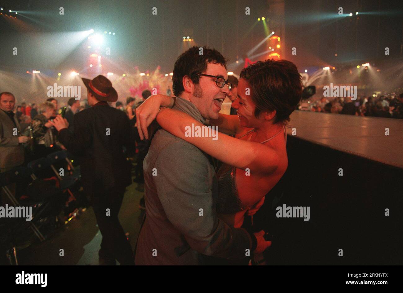 Millennium 2000 celebrations London couple kissing Stock Photo - Alamy