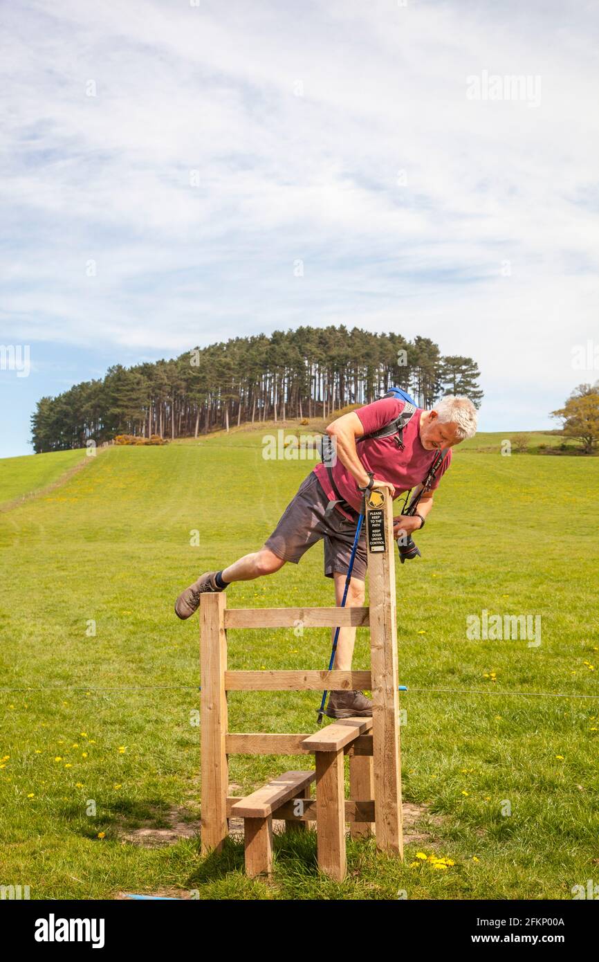 Over man climbing hi-res stock photography and images - Alamy