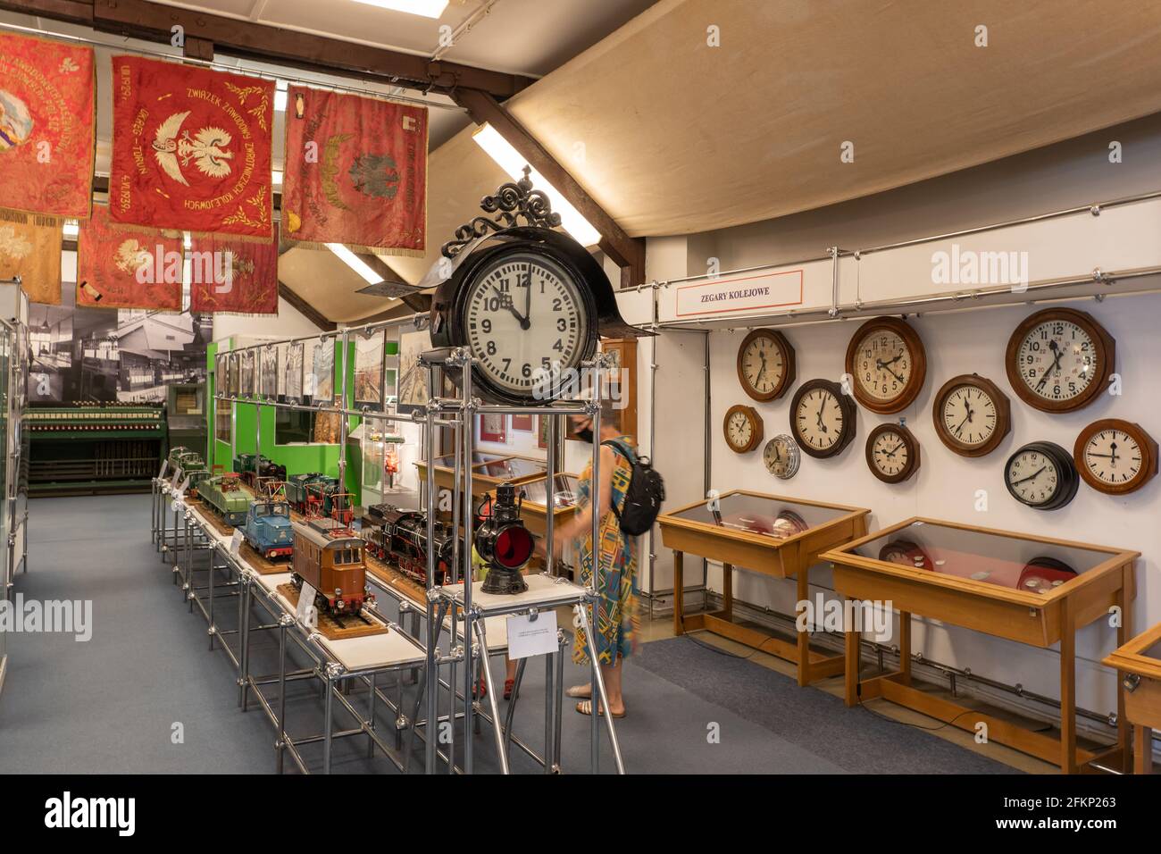 Exhibition with locomotives models and old vintage railway clocks in ...
