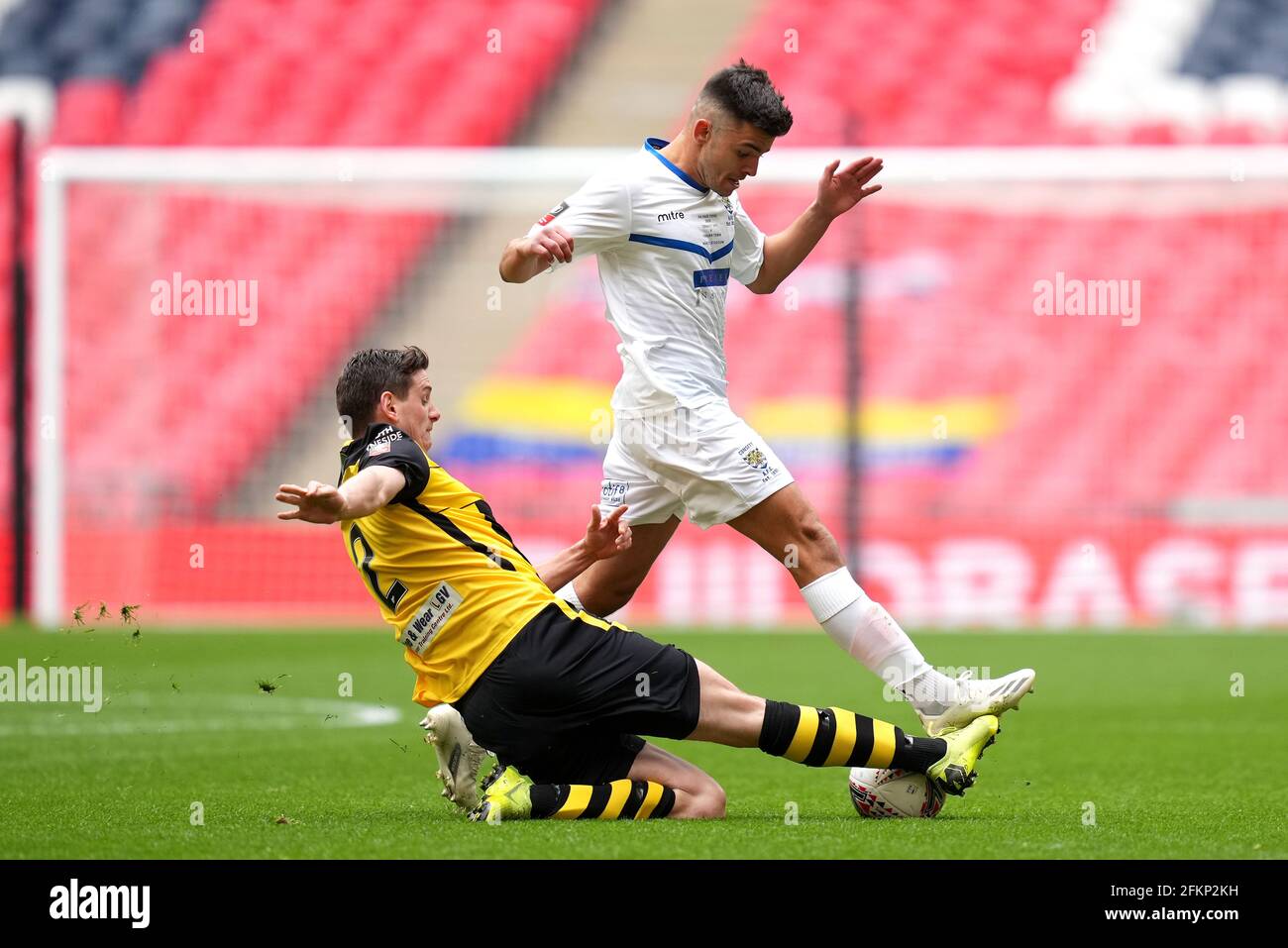 Consett's Matthew Cornish (right) is tackled by Hebburn Town's Daniel ...