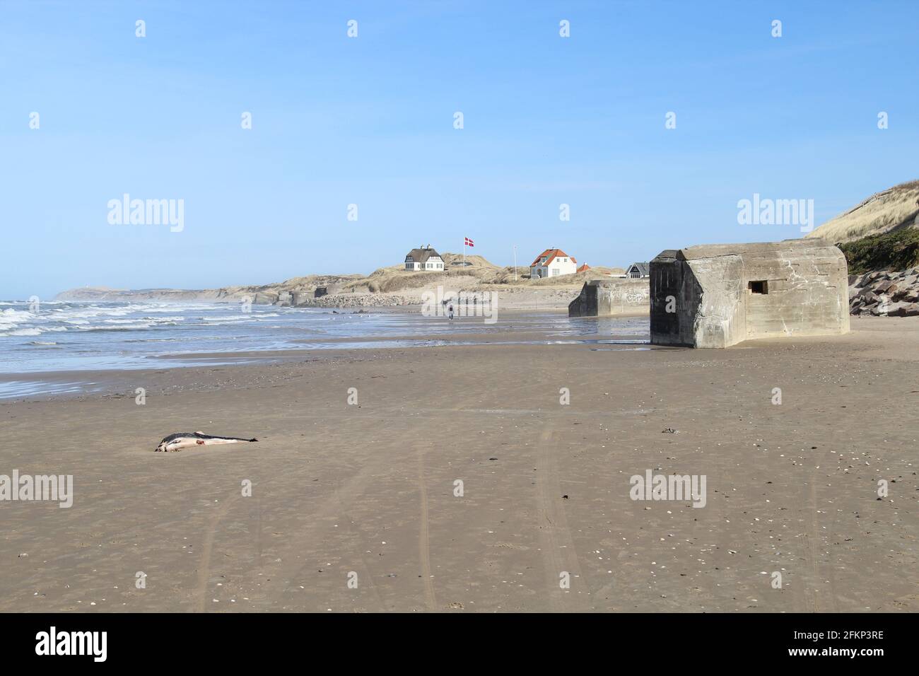 Lokken beach with different buildings in Denmark with the harbor ...