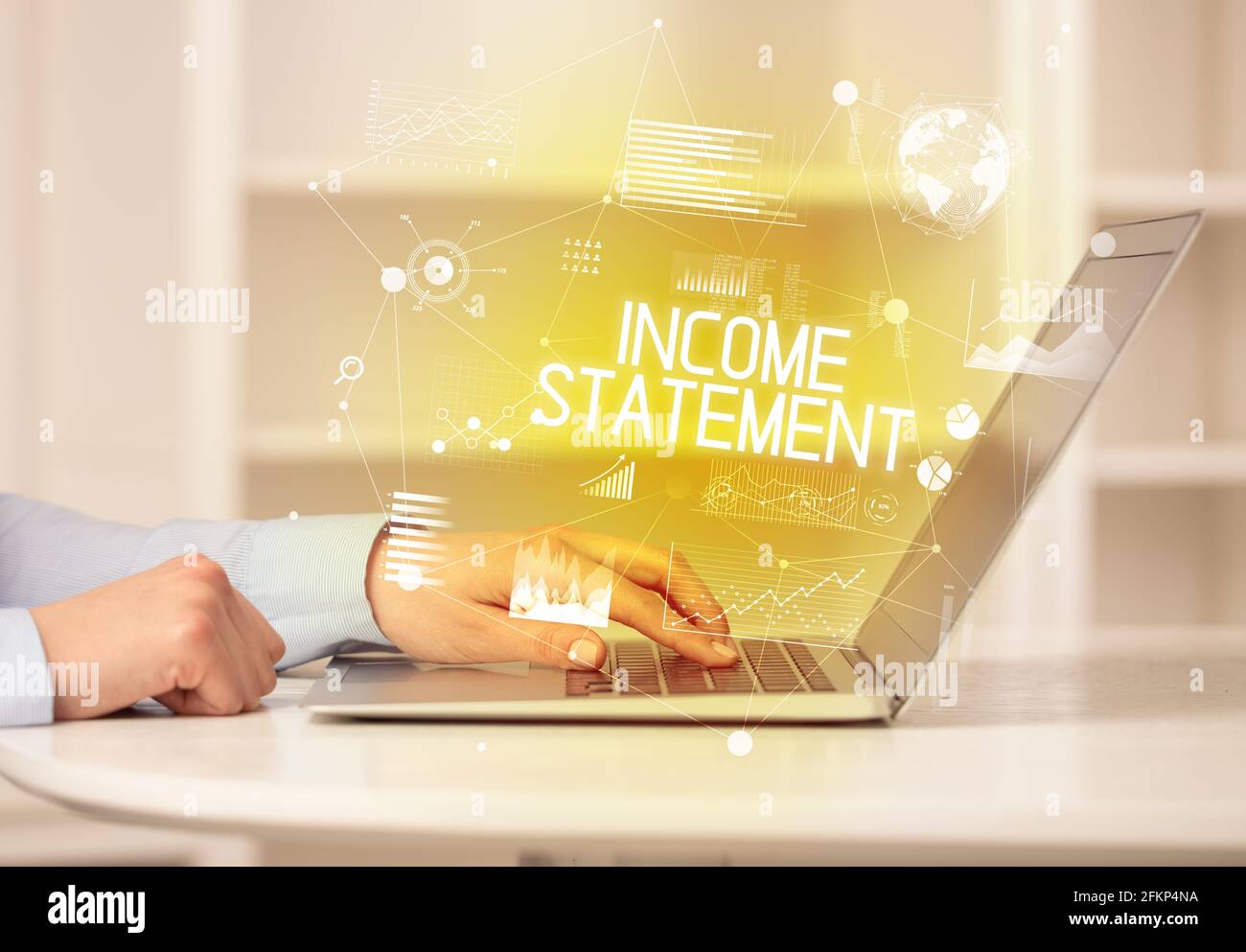 Side view of a business person working on laptop Stock Photo - Alamy