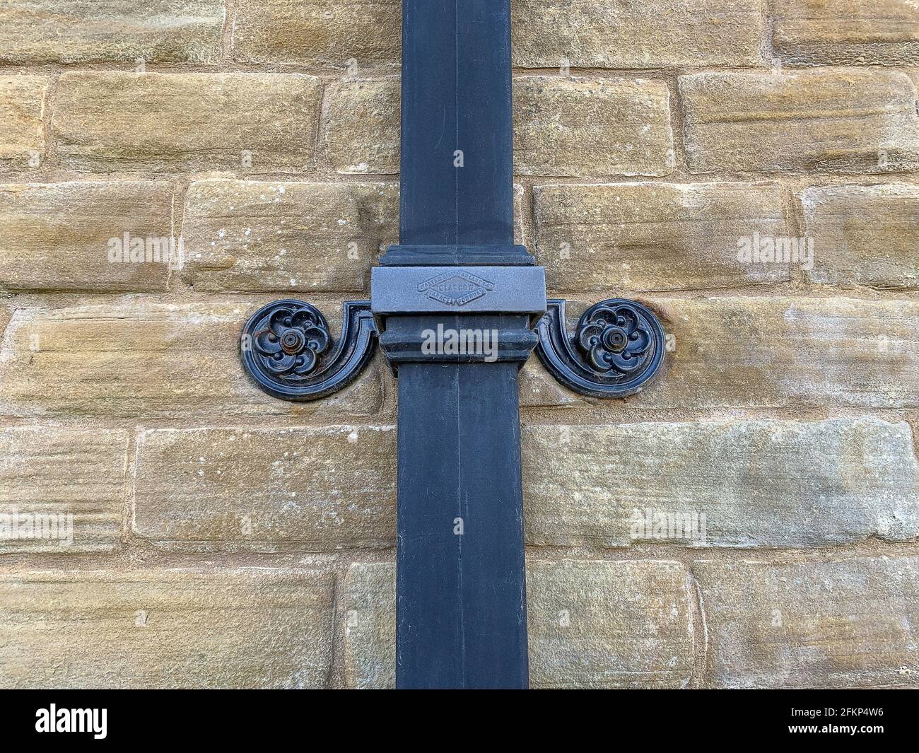 Decorative cast iron rainwater pipe on exterior of The Battery building ...
