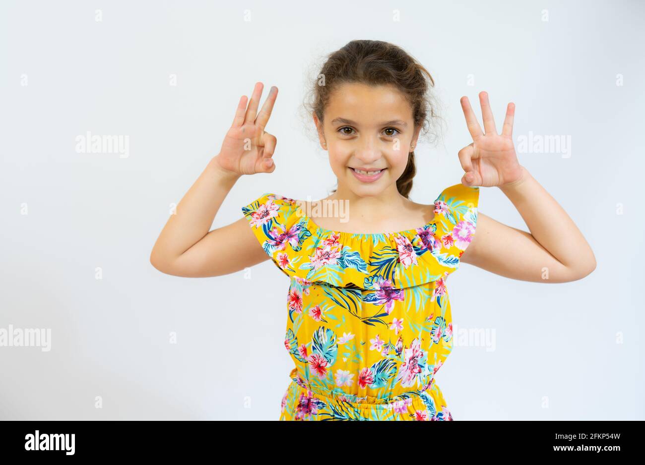 little girl shows sign okay isolated on a white background Stock Photo ...