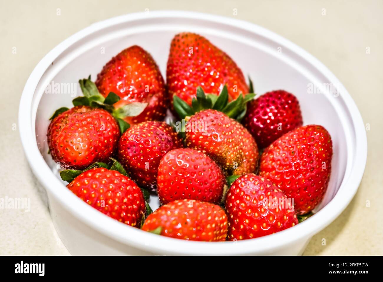 Indian sweet red strawberry packing container in garden looking awesome ...