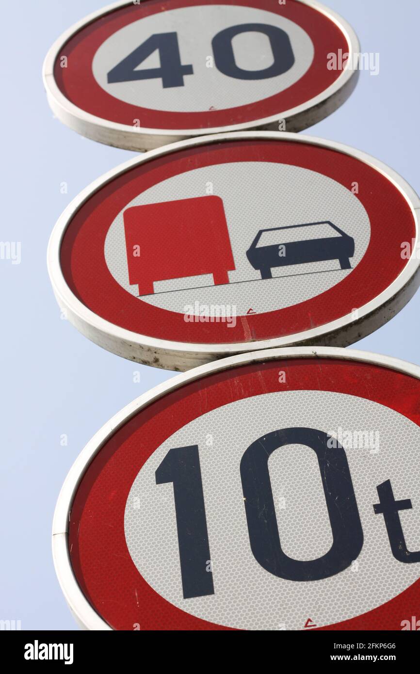 Vertical shot of three traffic signs in one piece - concept of secure ...