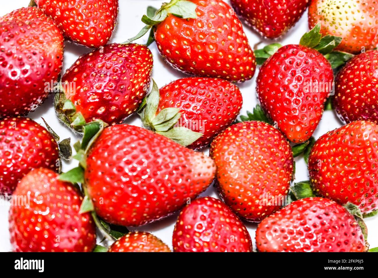 Indian sweet red strawberry packing container in garden looking awesome ...