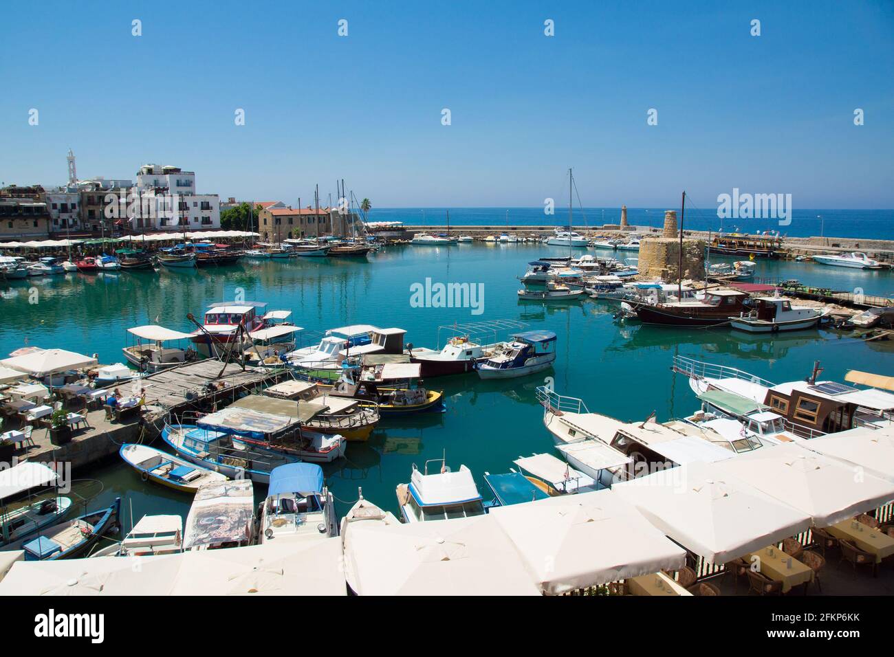KYRENIA, CYPRUS - Jul 29, 2012: The harbour of Kyrenia with many boats ...
