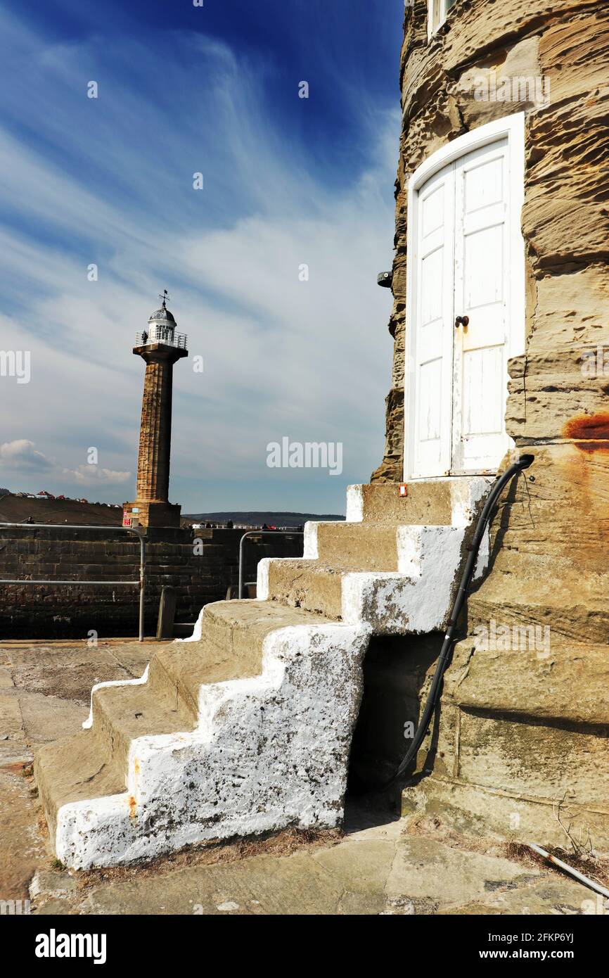 Whitby Lighthouse and Pier Stock Photo - Alamy