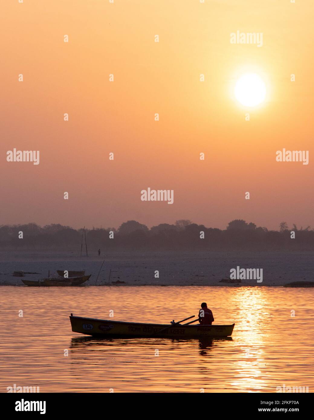boating on River Ganga when sun rise at Varanasi Stock Photo Stock ...