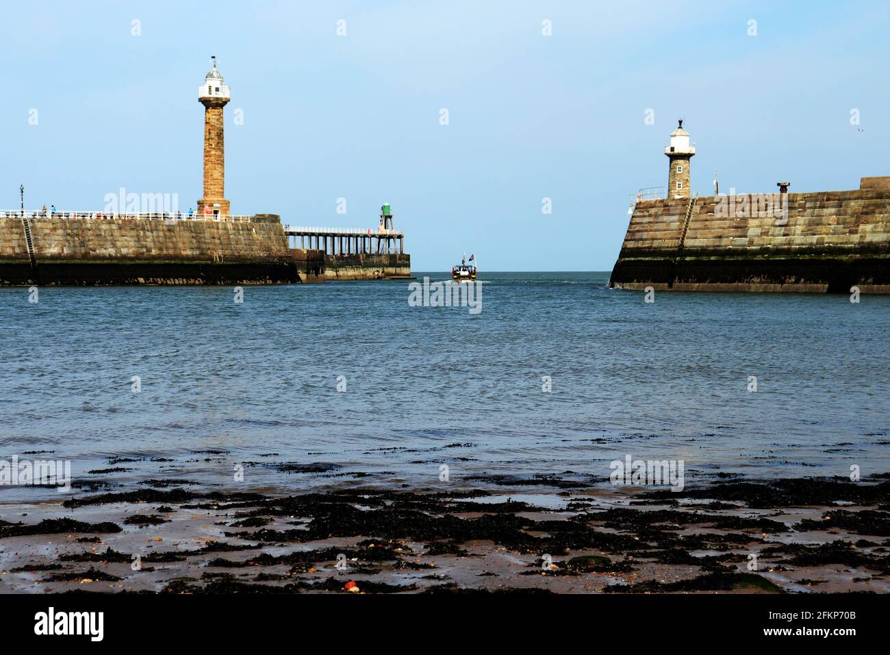 Whitby Lighthouse and Pier Stock Photo - Alamy