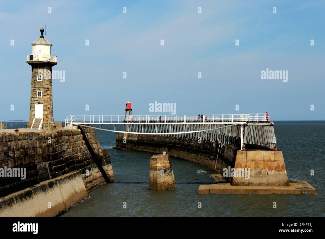 Whitby Lighthouse and Pier Stock Photo - Alamy