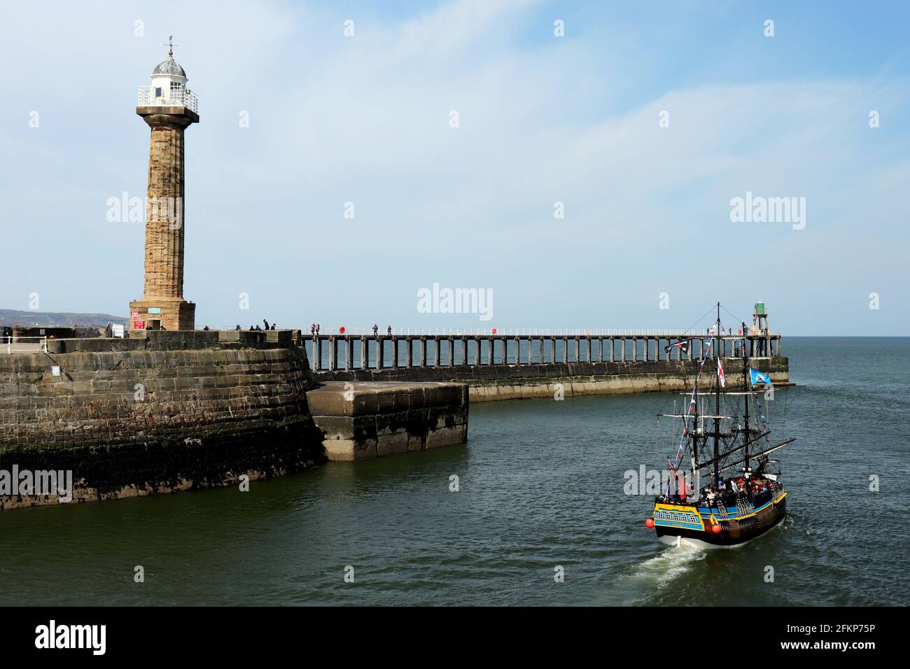 Whitby Lighthouse and Pier Stock Photo - Alamy