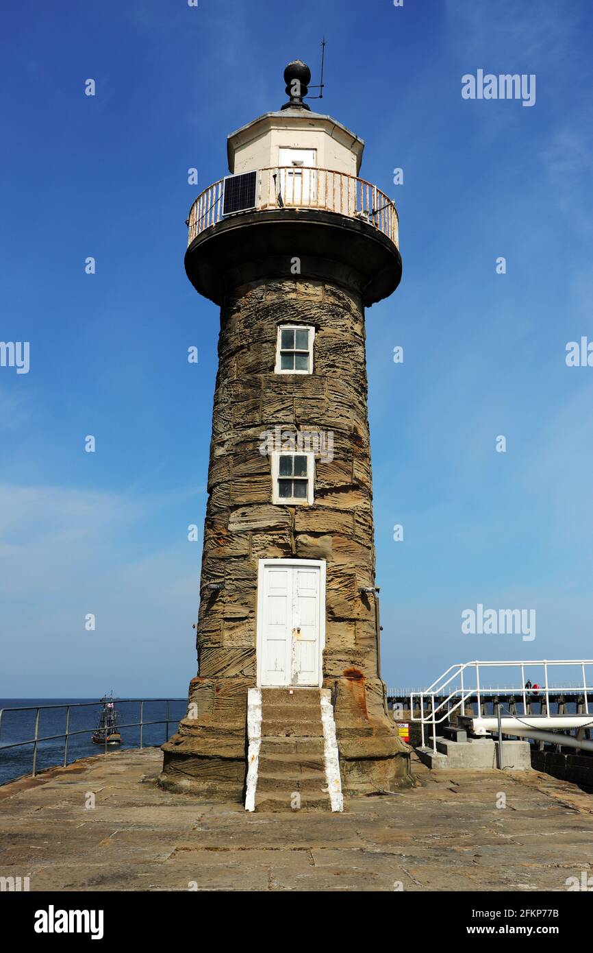 Whitby Lighthouse and Pier Stock Photo - Alamy